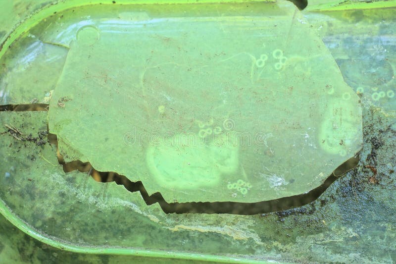 Texture from a Piece of Old Dirty Plastic with a Crack Stock Photo ...