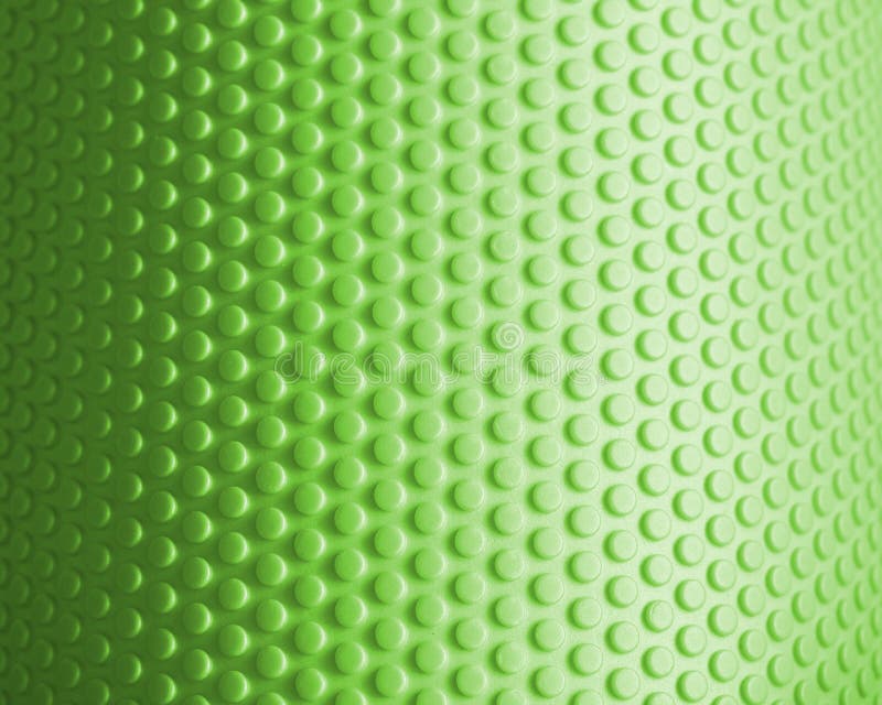 Green Textured Background Forming a Cylindrical Shape with Small Bumps ...