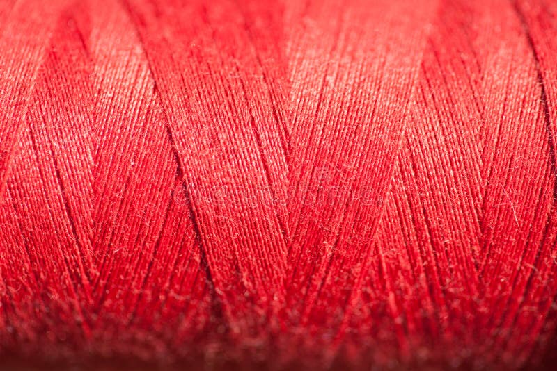Red thread spool macro stock image. Image of green, macro - 164744807