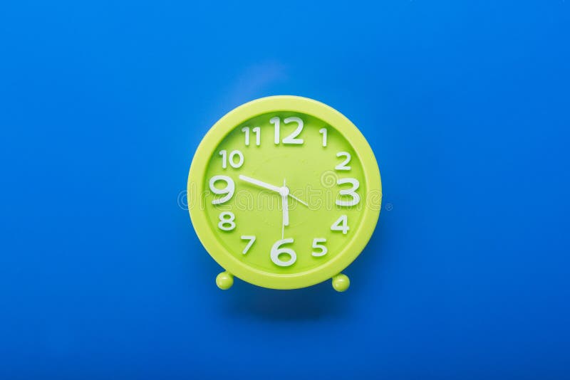 Green time clock stock image. Image of black, awake - 104237859