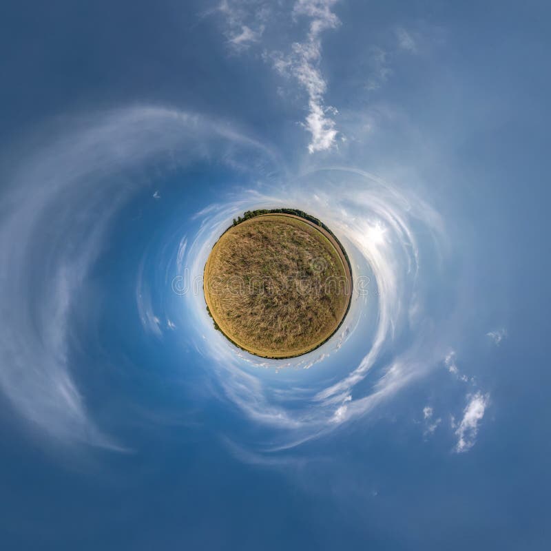 Green Tiny Planet in Blue Sky with Beautiful Clouds with Transformation ...