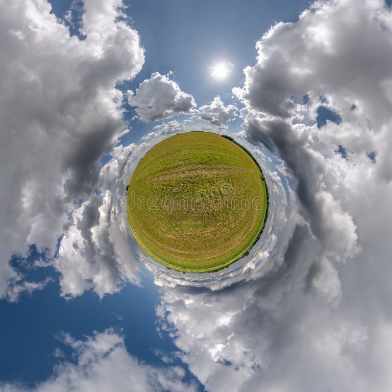 Green Tiny Planet in Blue Sky with Beautiful Evening Clouds with ...