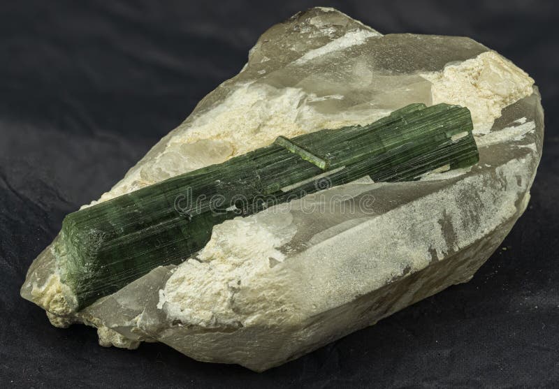 Green Tourmaline Stone on Matrix Against Black Background Stock Photo ...
