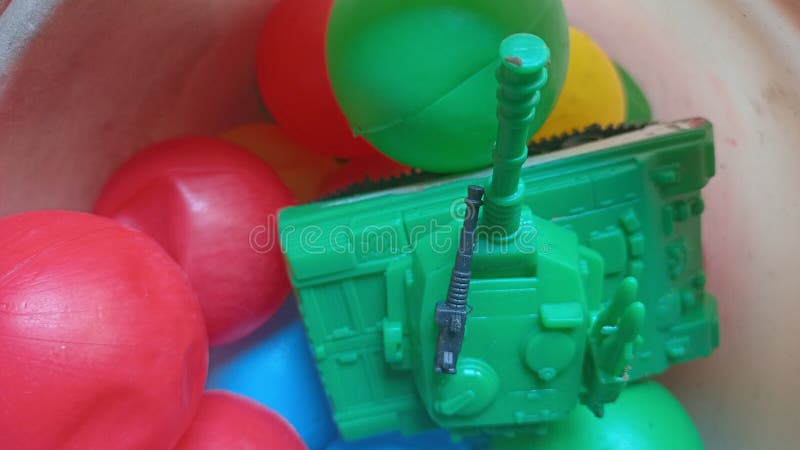 Green toy plastic tank stock image. Image of plastic - 287019415