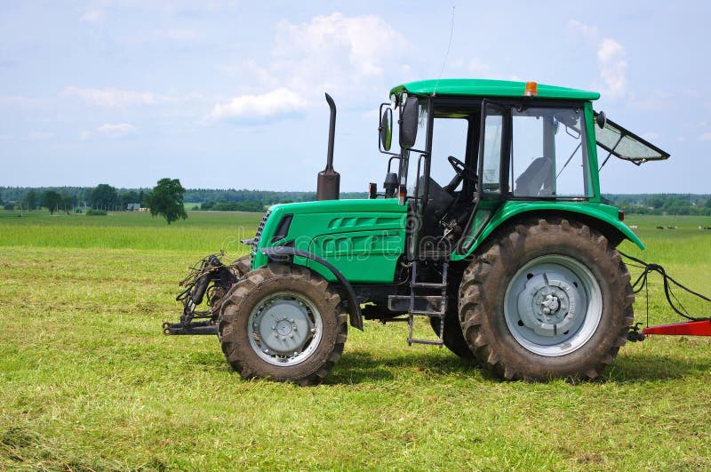 Green tractor stock photo. Image of vehicle, equipment - 14719580