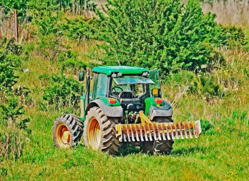 Green tractor in a field stock photo. Image of harvest - 41390054
