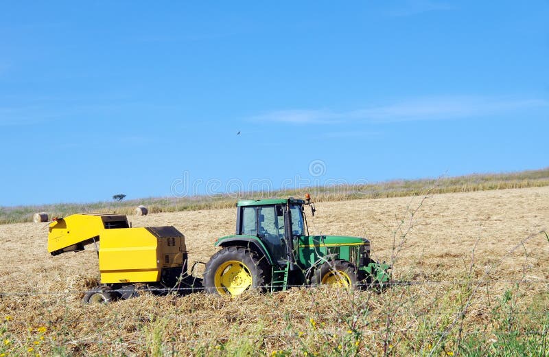 Green tractor in field editorial photography. Image of manual - 73864832