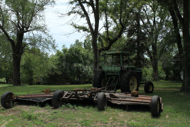 Green Tractor in a Park with Green Trees Stock Image - Image of wood ...