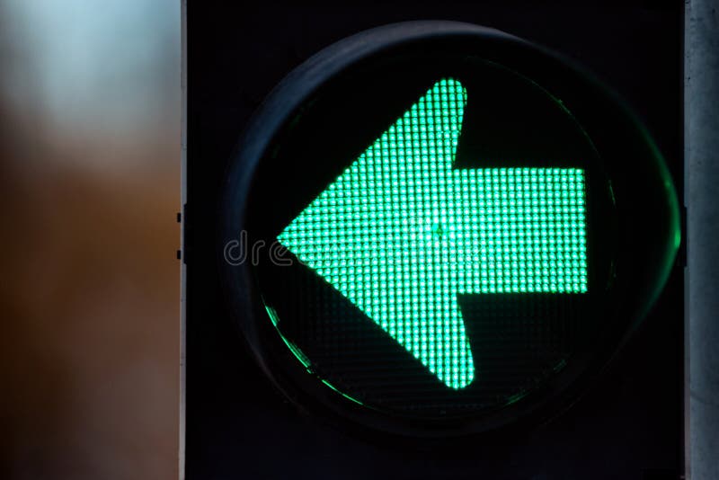 Green Traffic Light with Green Arrow Light Up. Turn Left Stock Photo ...