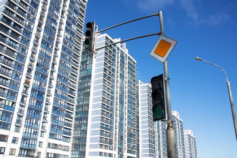 Green Traffic Light on the Background of Buildings Stock Image - Image ...