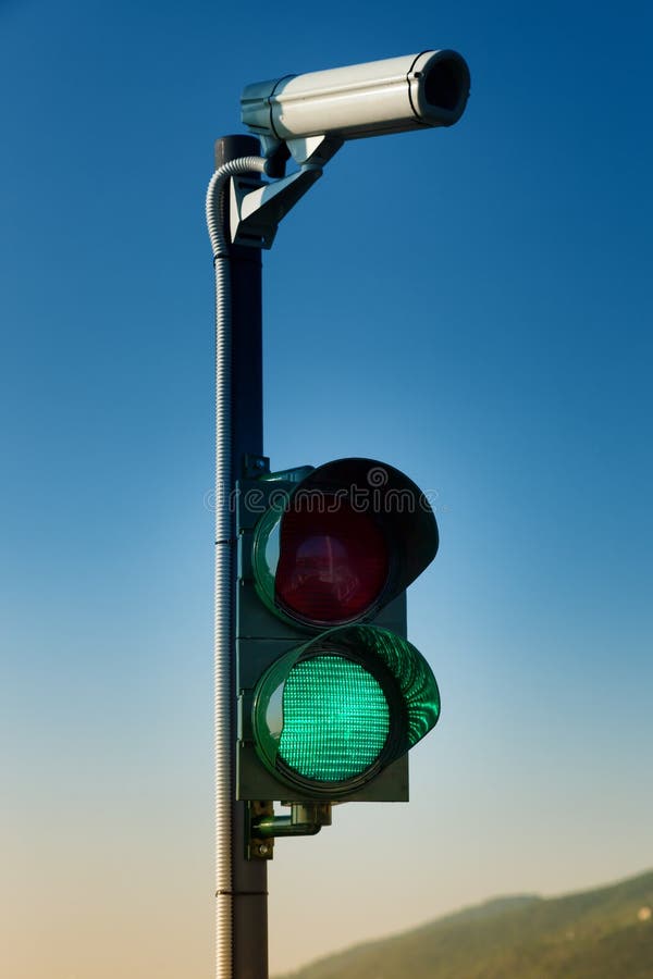 Green on Traffic Light with Security Camera Stock Image - Image of ...