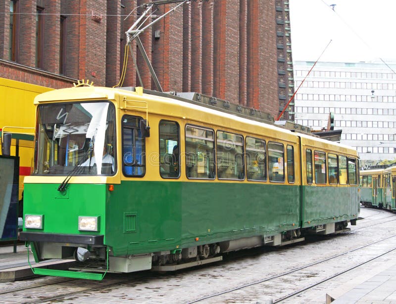 Green tram on street stock photo. Image of quick, intersection - 14542002
