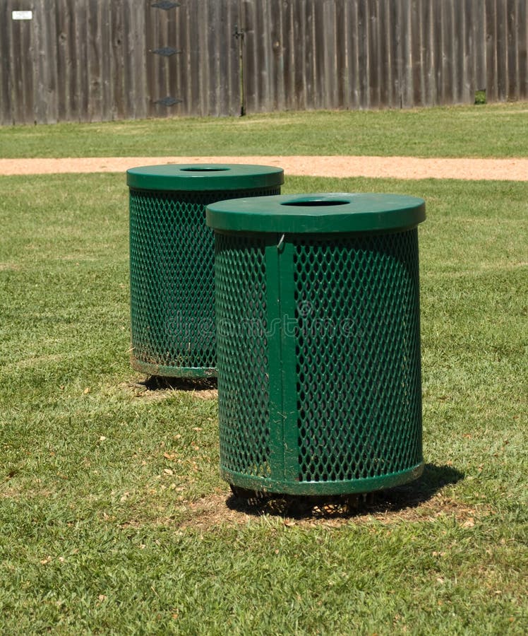 Green trash bins in a park stock photo. Image of disposal - 4878928