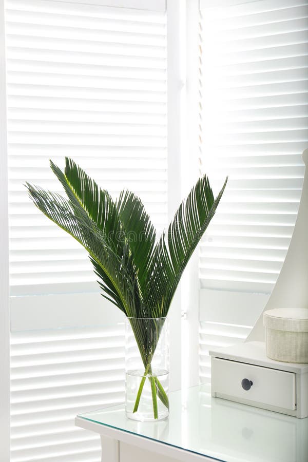 Green Tropical Leaves in Vase on Table. Modern Decor for Interior Stock ...