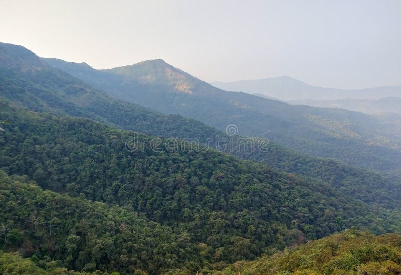 Green valley view with sky stock photo. Image of green - 182426086