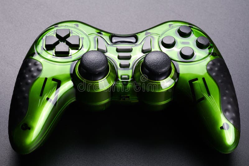 Green Video Game Controller on a Blurred Background. Stock Photo ...