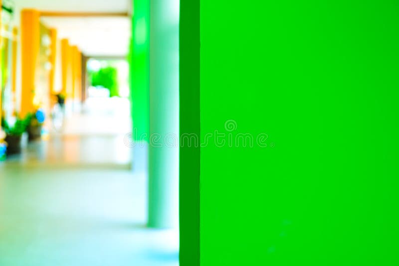 Green Wall with Defocused Corridor Background Stock Image - Image of ...