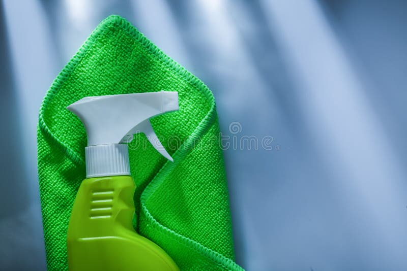 Green Washing Rag Sprayer on White Surface Stock Photo - Image of ...