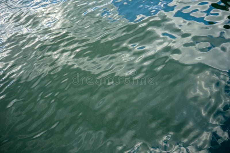 Green Water Motion Structure with Small Ripples Stock Photo - Image of ...