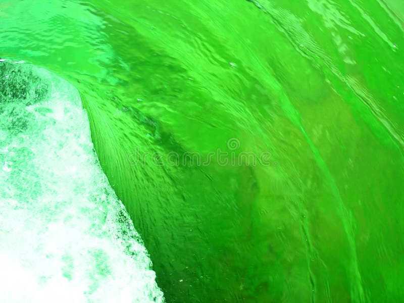 Green water swirl stock image. Image of wave, water, side - 1100663