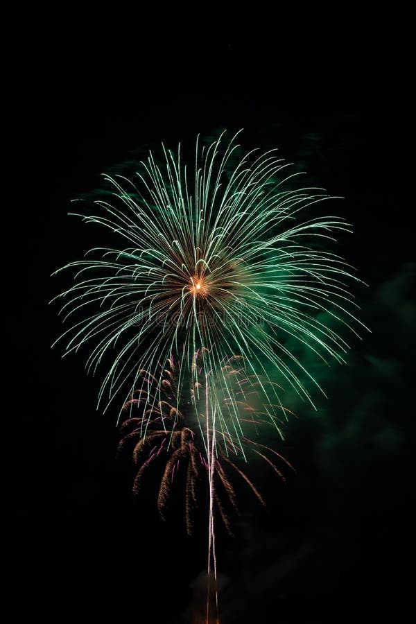 Green Wave Firework Exploding in the Air Stock Photo - Image of ...
