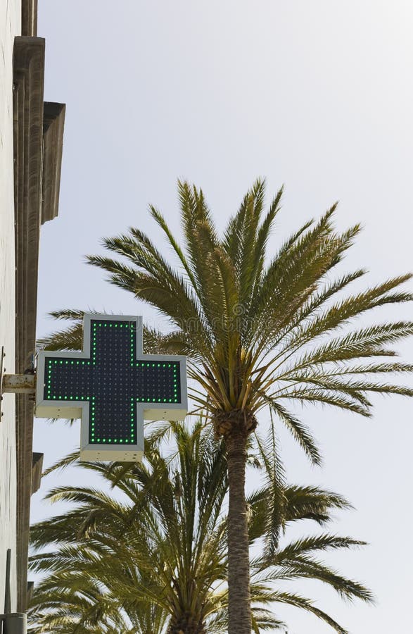 Green and White Pharmacy Sign with Palm Tree Background Stock Image ...