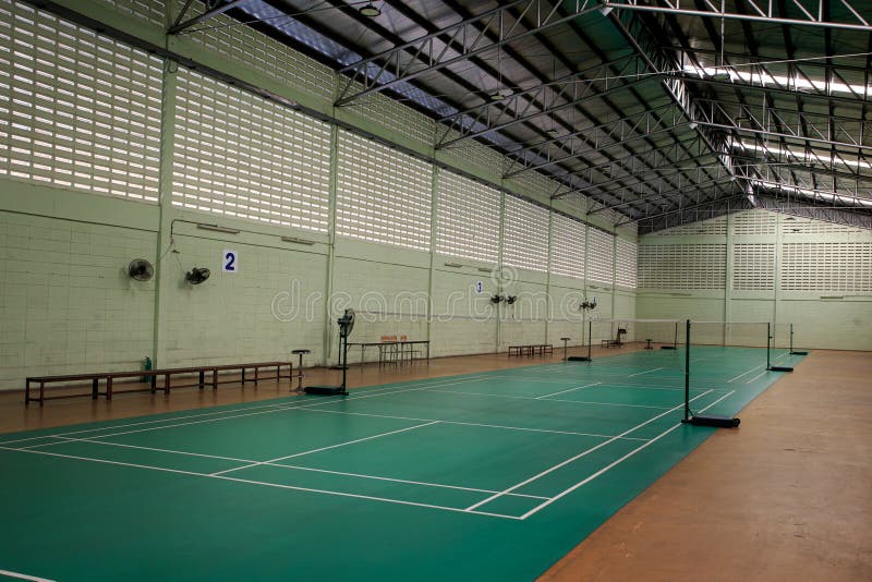 Green and White Tennis Court with a Net and a Few Benches Stock Photo ...