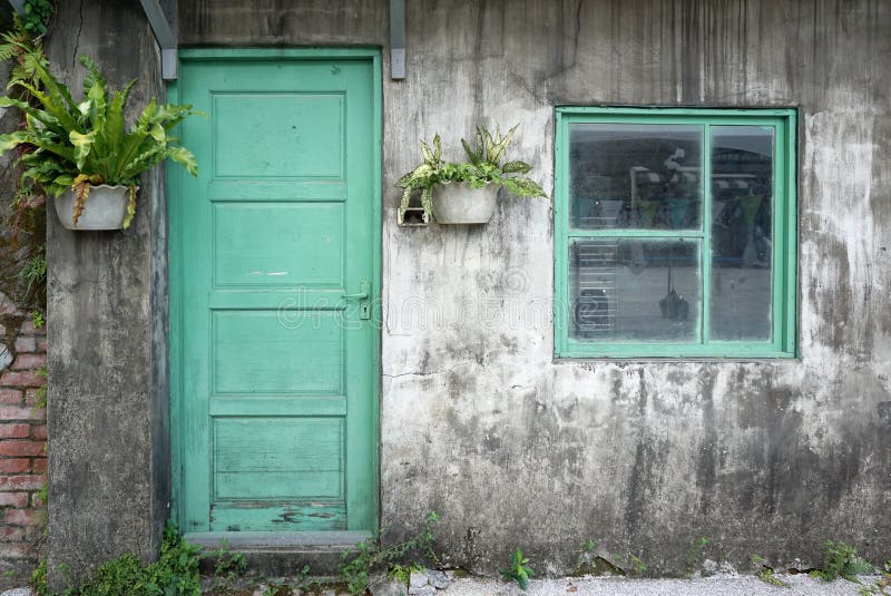 Green Window and Door Frame with Rustic Building Wall Stock Photo ...