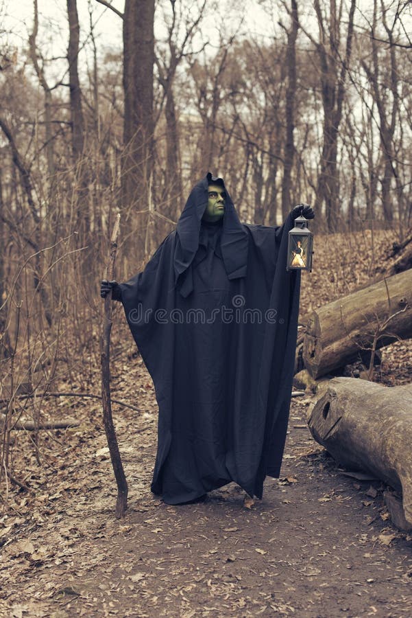 The Green Witch in the Autumn Forest Stock Image - Image of cloak ...