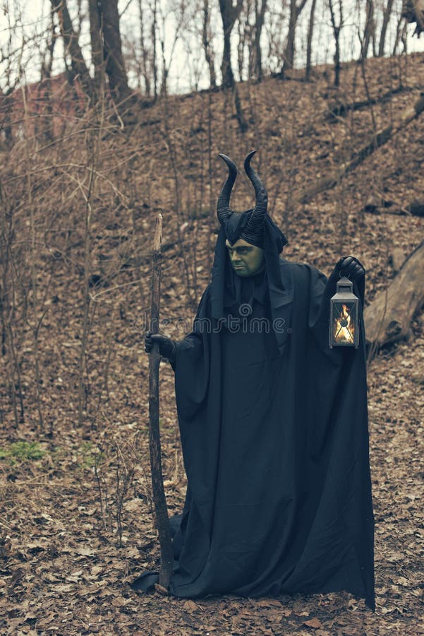 The Green Witch in the Autumn Forest Stock Photo - Image of costume ...