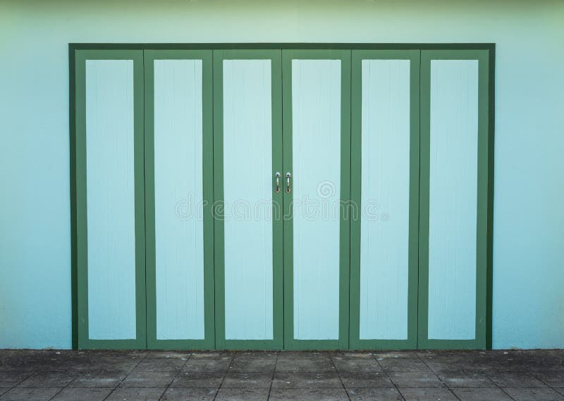 Green Wooden Doors with Green Walls, Vintage Style Stock Image - Image ...