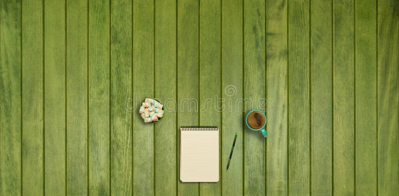Green Wooden Office Desk with Notebook, Pencil, Coffe and Marshmallow ...