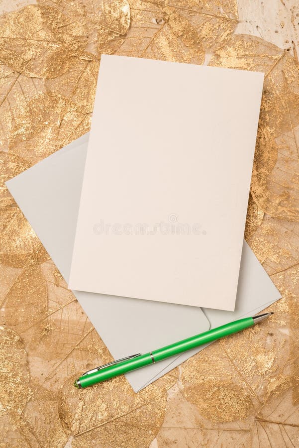 Green Writing Pen and Empty Greeting Card on Dried Leaves Stock Photo ...