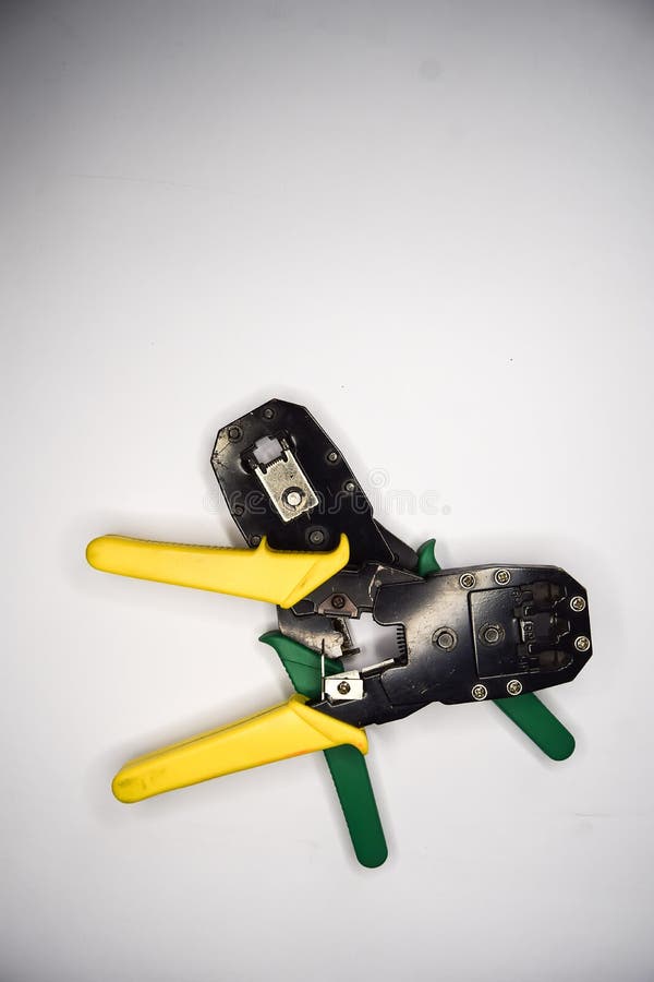 Green and Yellow Adjustable Wire Stripper Isolated on a White ...