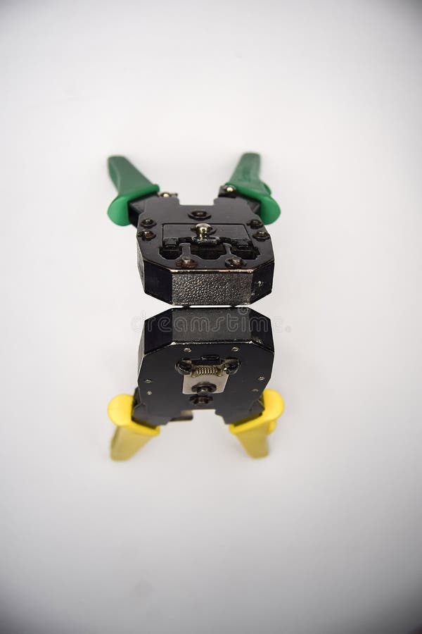 Green and Yellow Adjustable Wire Stripper Isolated on a White ...