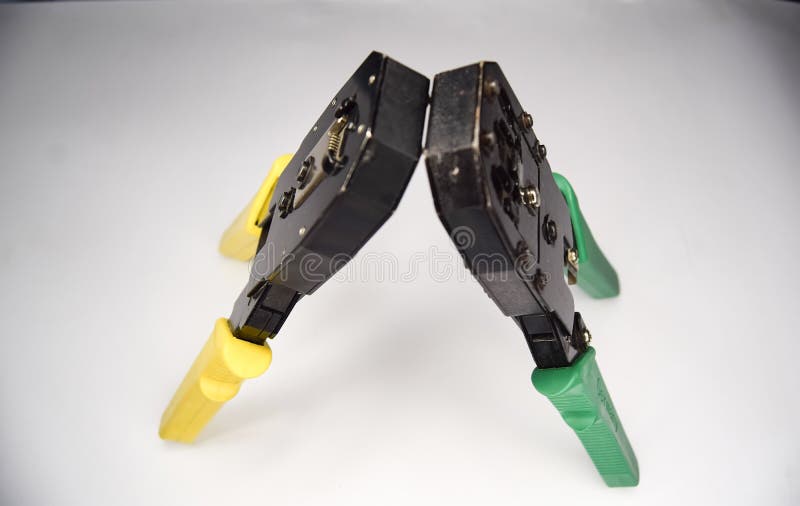 Green and Yellow Adjustable Wire Stripper Isolated on a White ...
