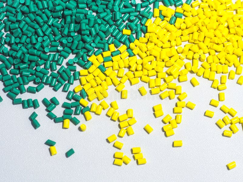 Red and White Masterbatch Granules Spilling from a Shot Glass Stock ...