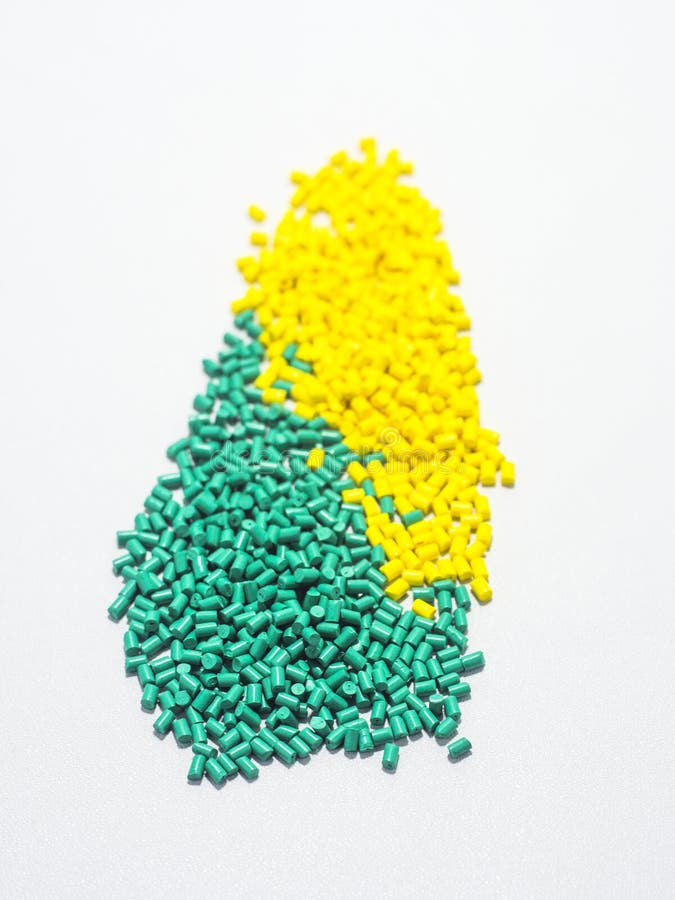 Red and White Masterbatch Granules Spilling from a Shot Glass Stock ...