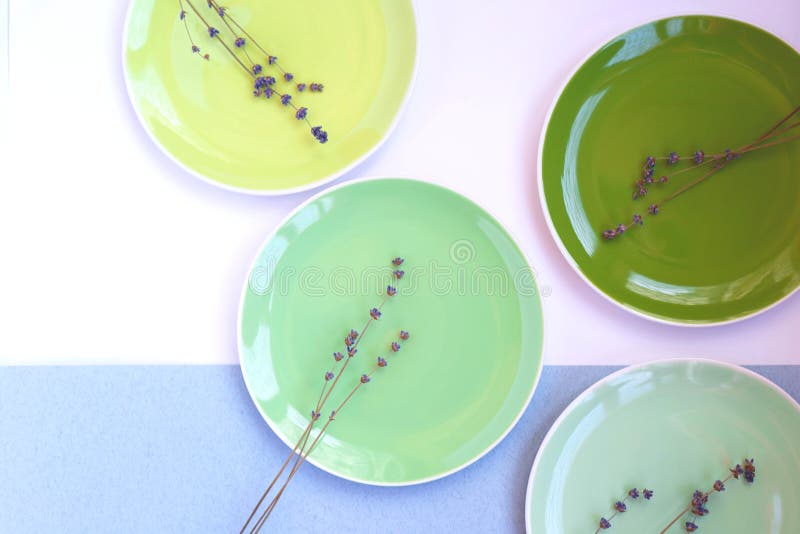 Green and Yellow Plates on a White Background. Rustic Style Stock Photo ...