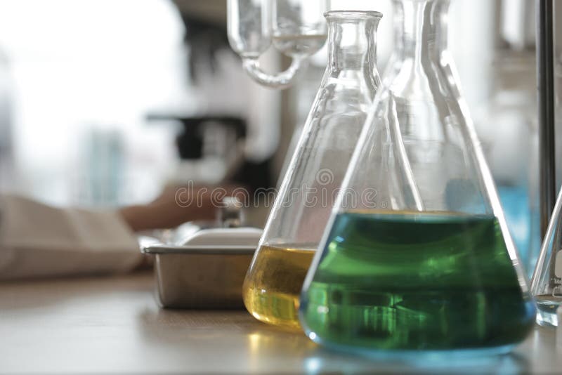 Green Solution In Beaker In Science Lab Stock Photo - Image of science ...