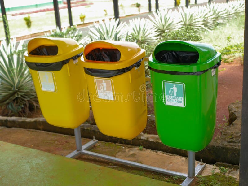 Green and Yellow Trash Can, Garbage Can, Rubbish Bin, Concept of ...