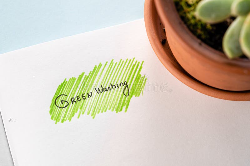 Greenwashing Concept. Drawing on Paper with Text and Green Marker ... Greenwashing Concept. Drawing on Paper with Text and Green Marker ...