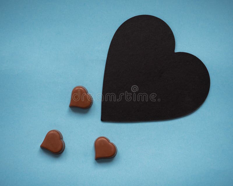 Greeting Card with Hearts Made of Chocolate and Black Plate for Writing ...