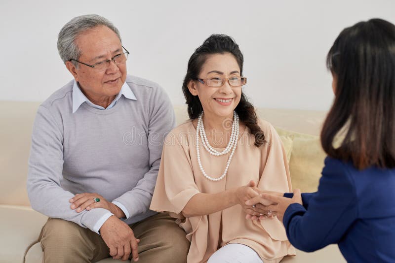 Greeting Clients with Handshake Stock Image - Image of shaking, real ...
