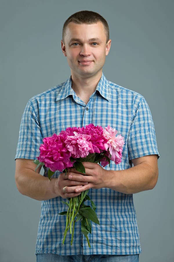 Greetings. Smiling Man Casual Style with Flowers. Stock Image - Image ...