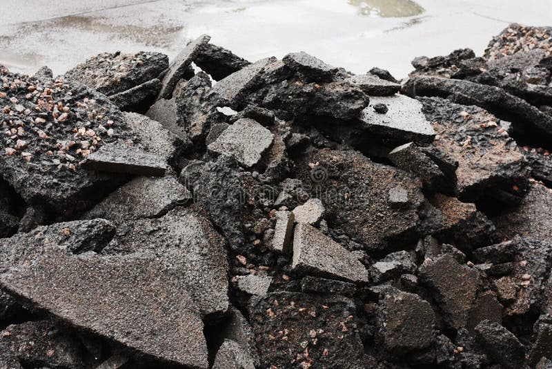 Grey Asphalt is Lying in Chunks on the Road Stock Image - Image of ...