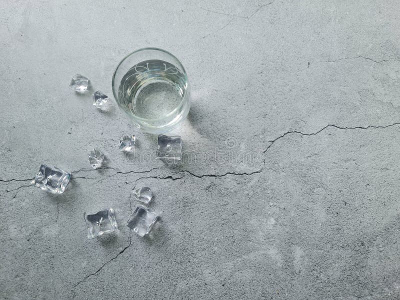Grey Background Decorated with Glass of Water and Cubic Ices Stock ...