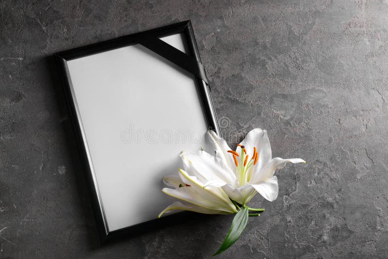 Blank Funeral Frame and Flowers on Grey Background Stock Photo - Image ...