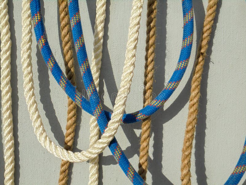 The Grey Background Shows Ropes and Ropes of Different Diameters and ...