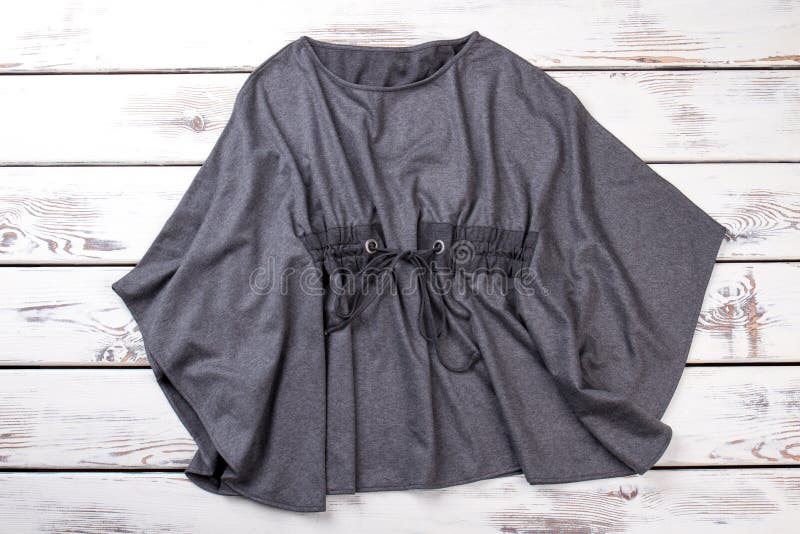 Grey blouse with string. stock image. Image of color - 111966983